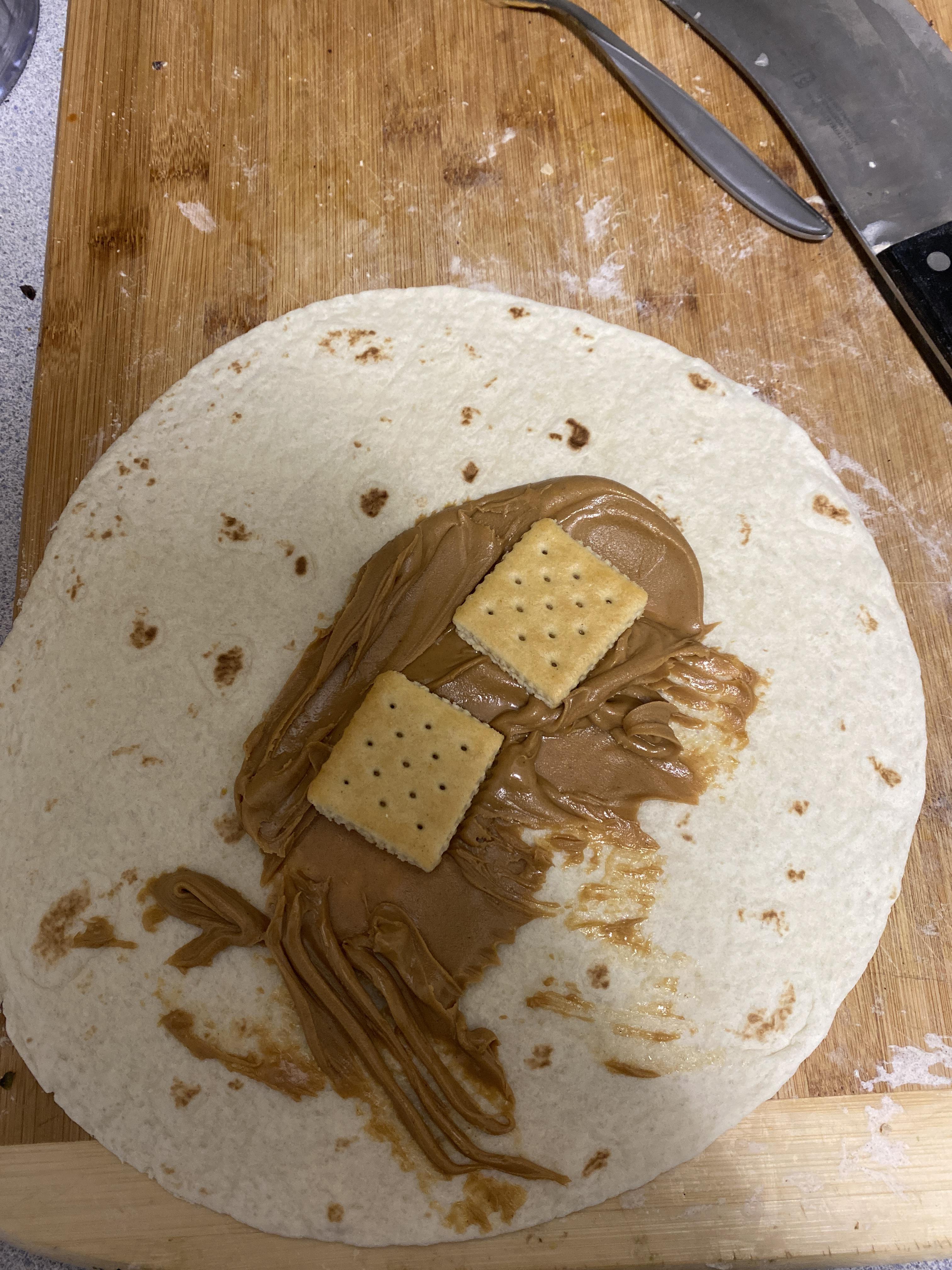 Peanut butter inside of a cracker inside of peanut butter inside of a tortilla 😳 | Scrolller