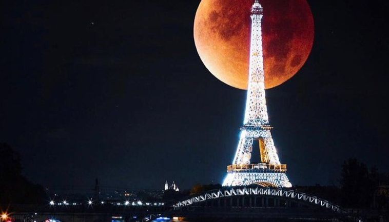 Pink moon in Paris. | Scrolller