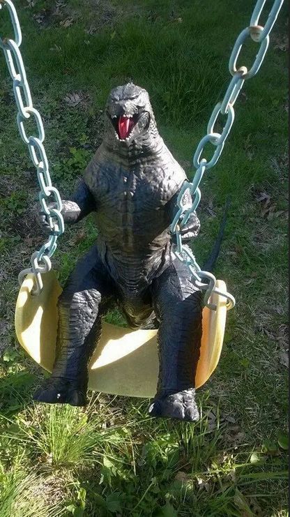 POV Godzilla on a swing | Scrolller