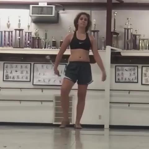 Practicing her baton routine | Scrolller
