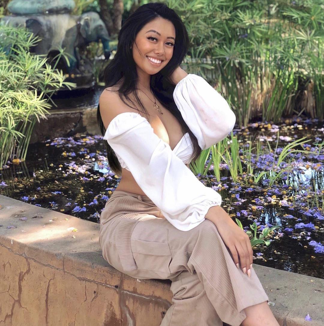 Pretty Babe at a Garden | Scrolller