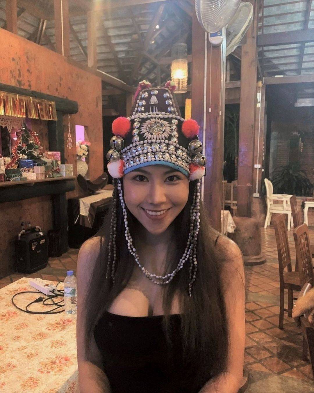 Pretty girl bursting out of traditional costume | Scrolller