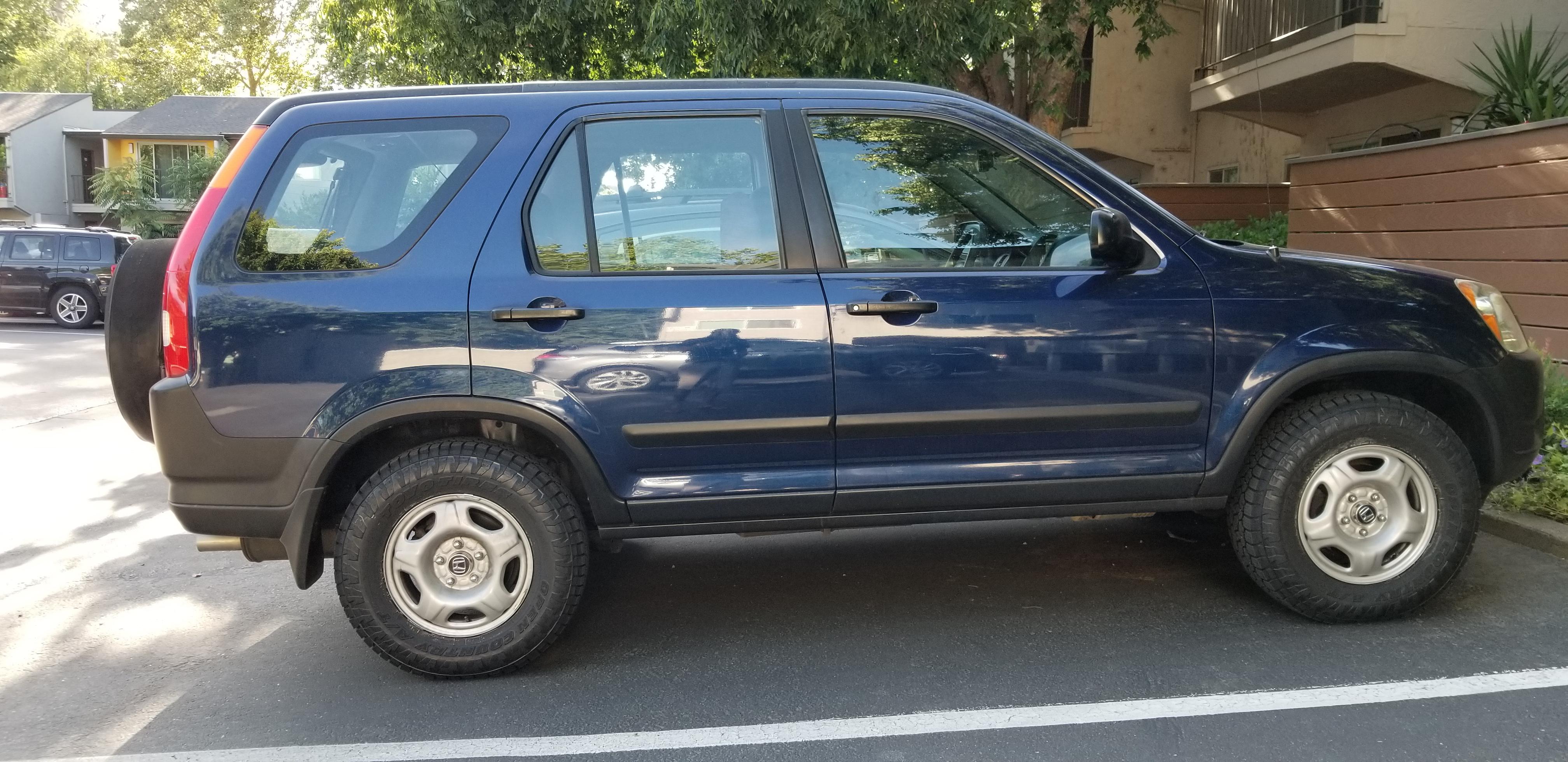 Put 215/75/15s on stock 2nd Gen | Scrolller