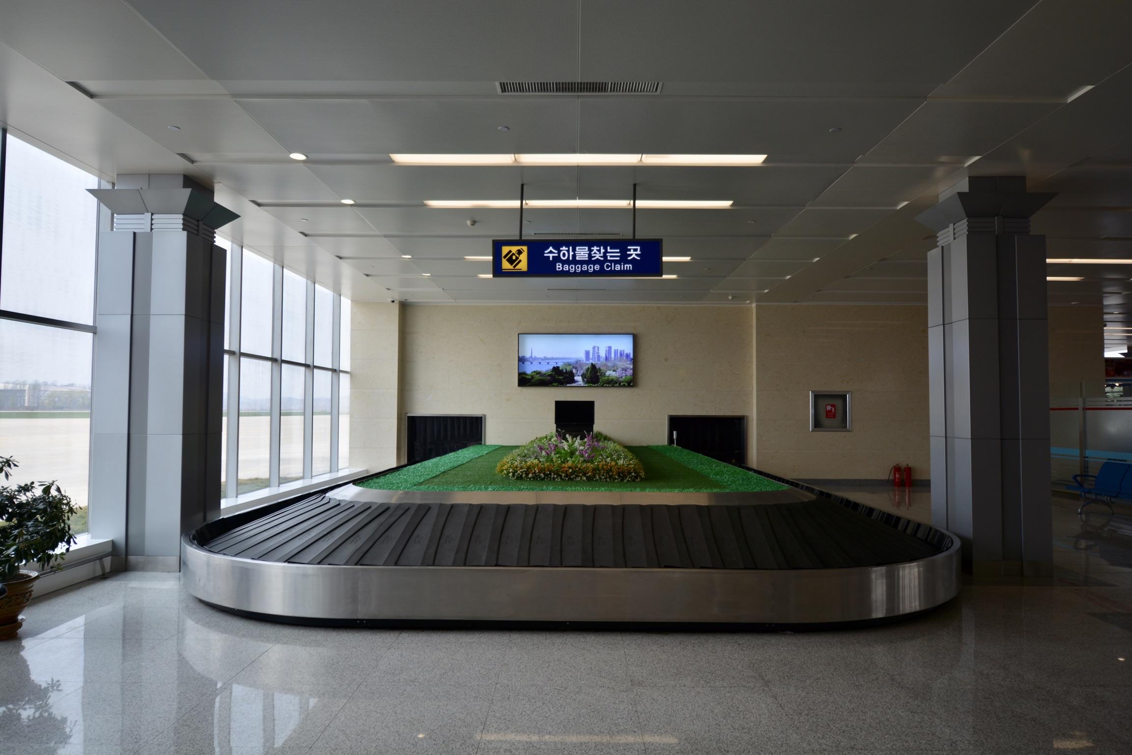 Pyongyang Sunan airport baggage claim carousel. | Scrolller