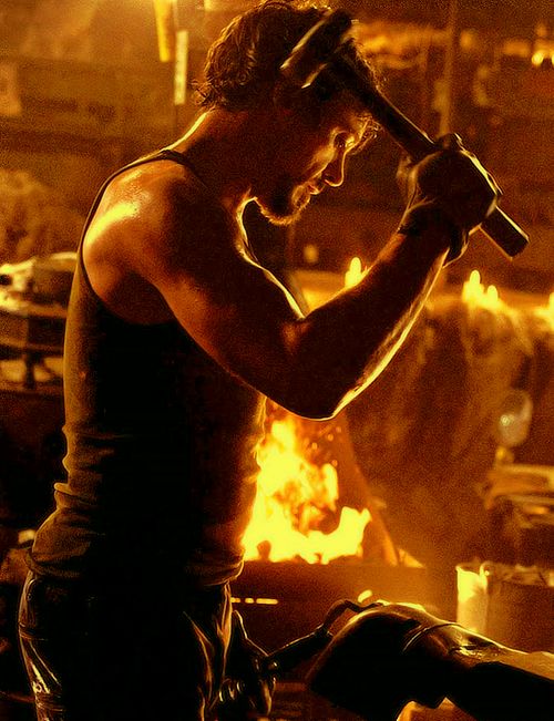 RDJ as Tony Stark, making his first suit. | Scrolller