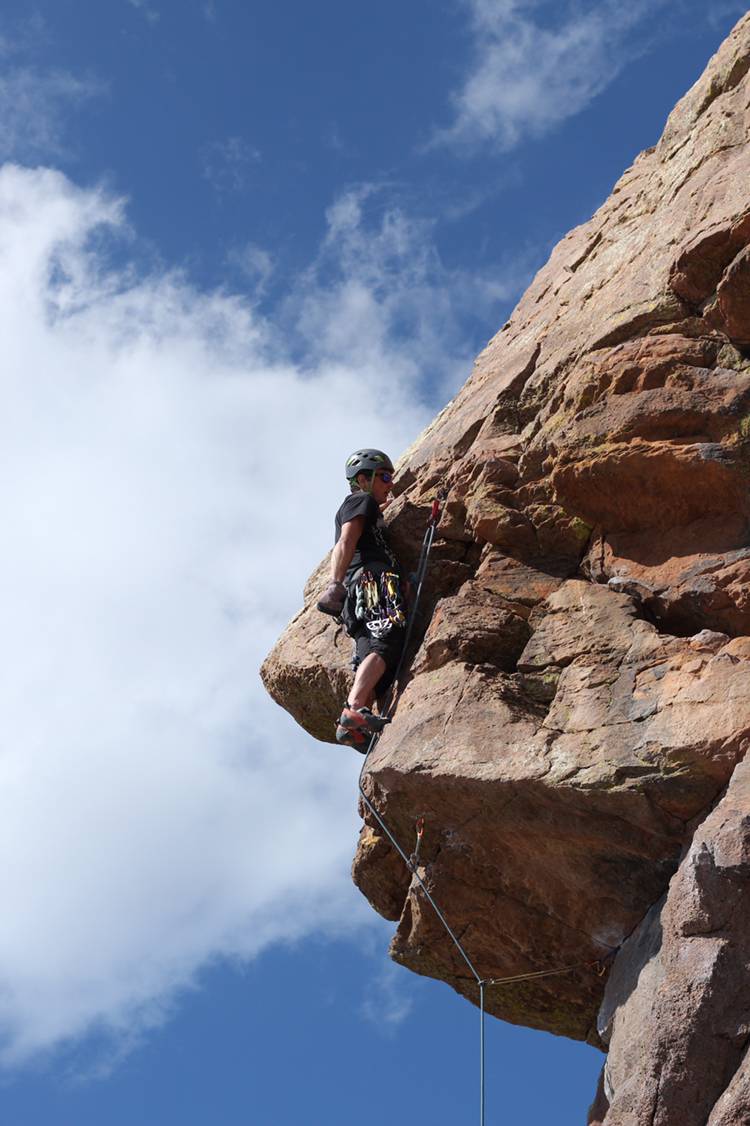 Resting above the roof. This was my first 10c trad route! | Scrolller