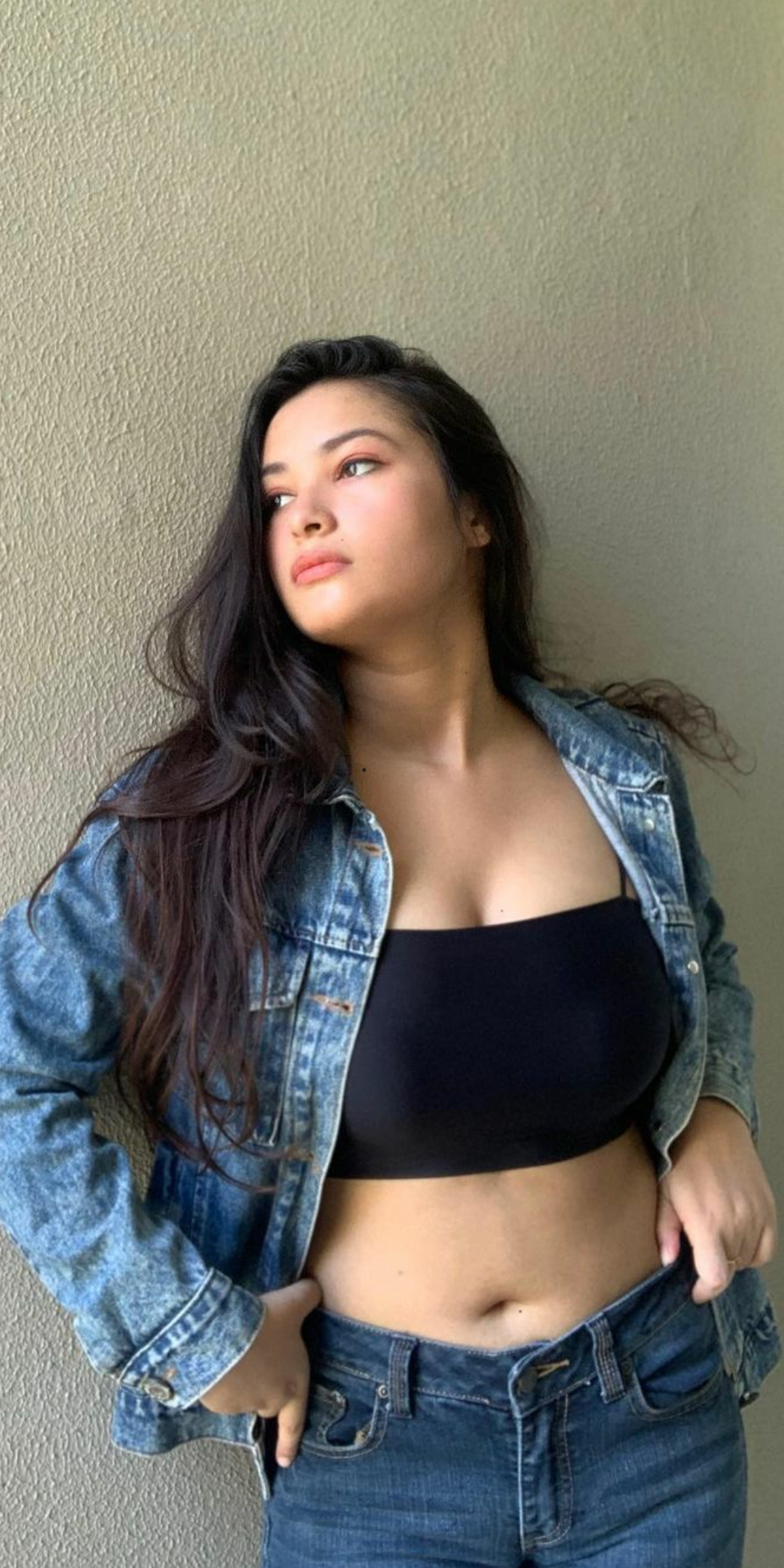 Saloni Dwivedi navel in black tube top and denim jacket. | Scrolller