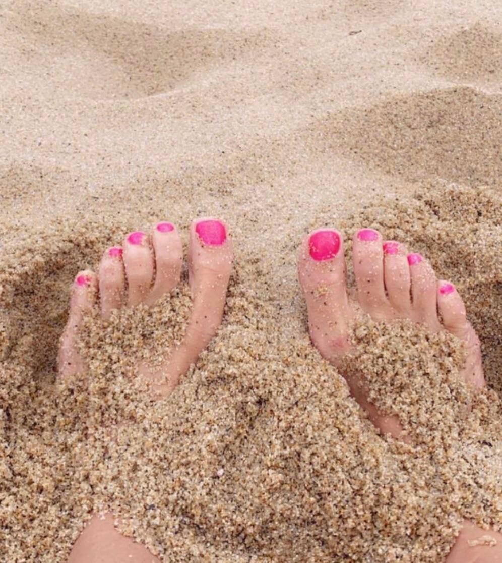 MILF toes in the sand | Scrolller