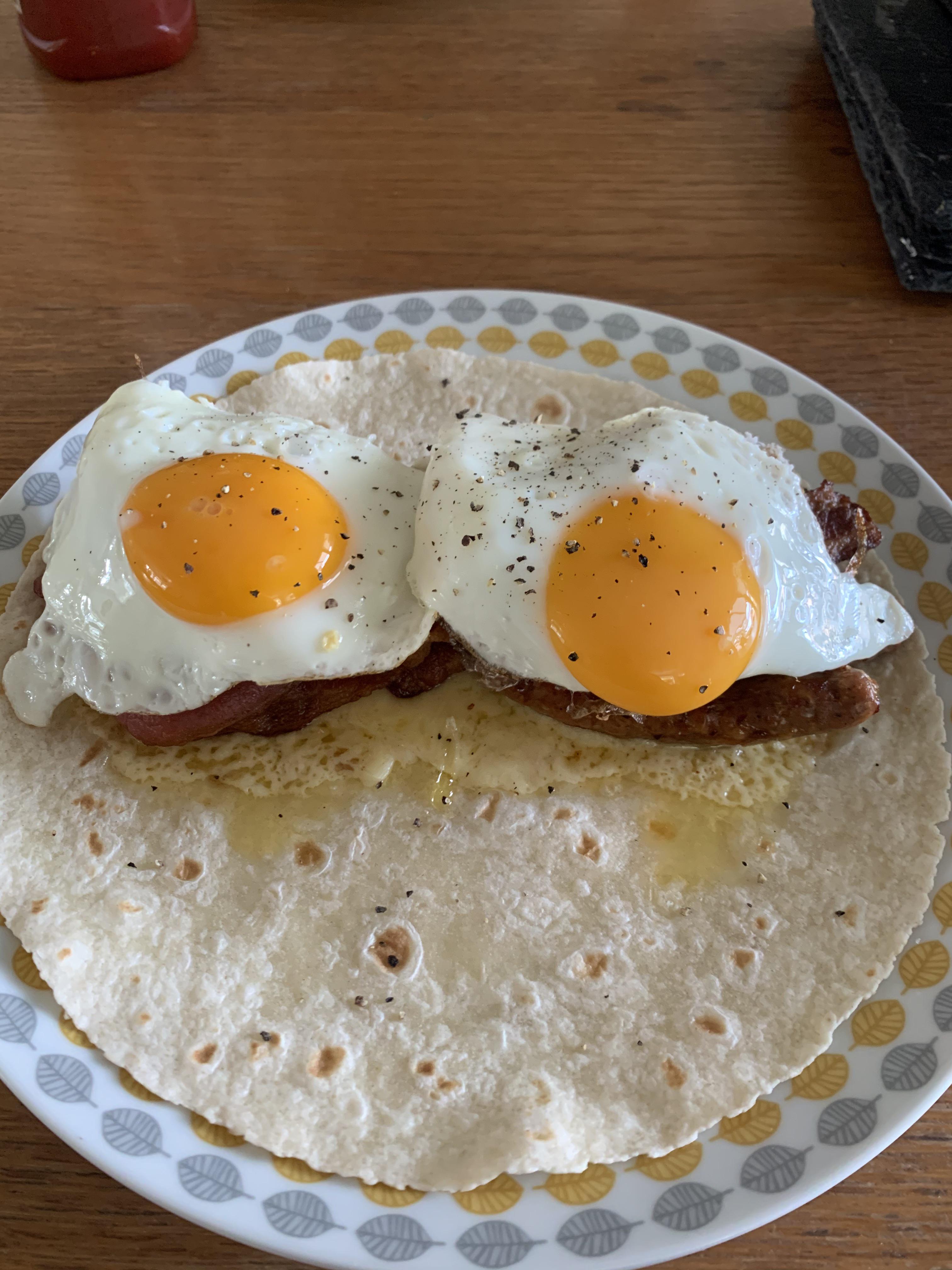 Sausage bacon egg cheese tortilla wrap. | Scrolller