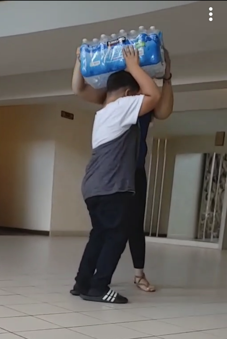saw this woman forcing her kid to carry the water on his head/shoulder, and berating him every ...