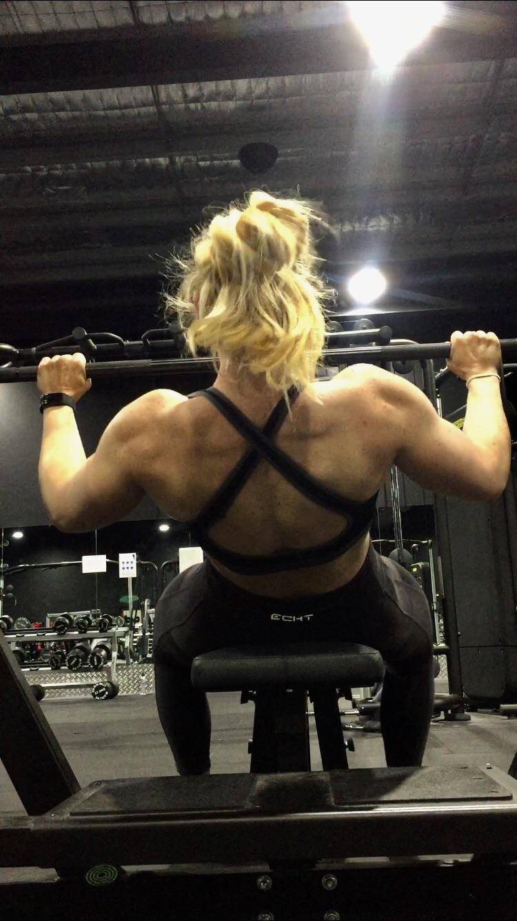 Shoulders and back are popping, setting up for bench press | Scrolller