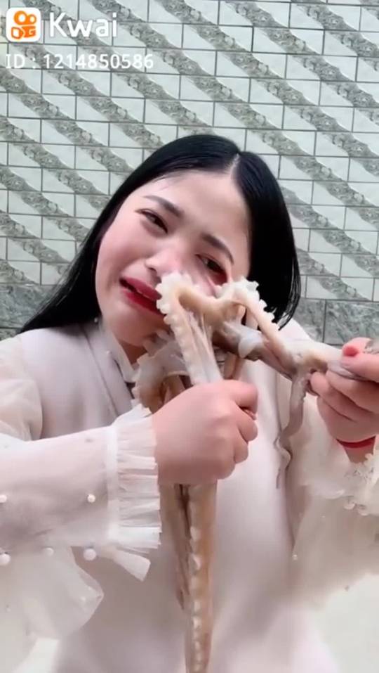 She tried to eat a live Octopus on camera. | Scrolller
