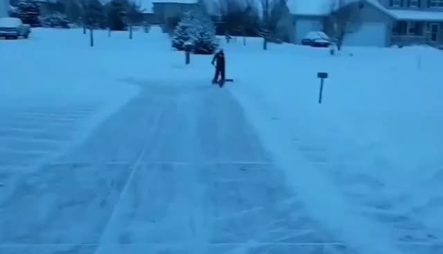 Shoveling snow on a hoverboard | Scrolller