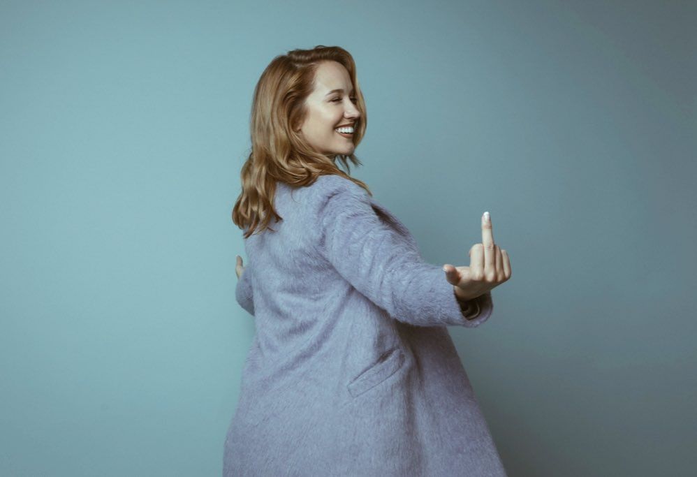 Showing the finger | Scrolller