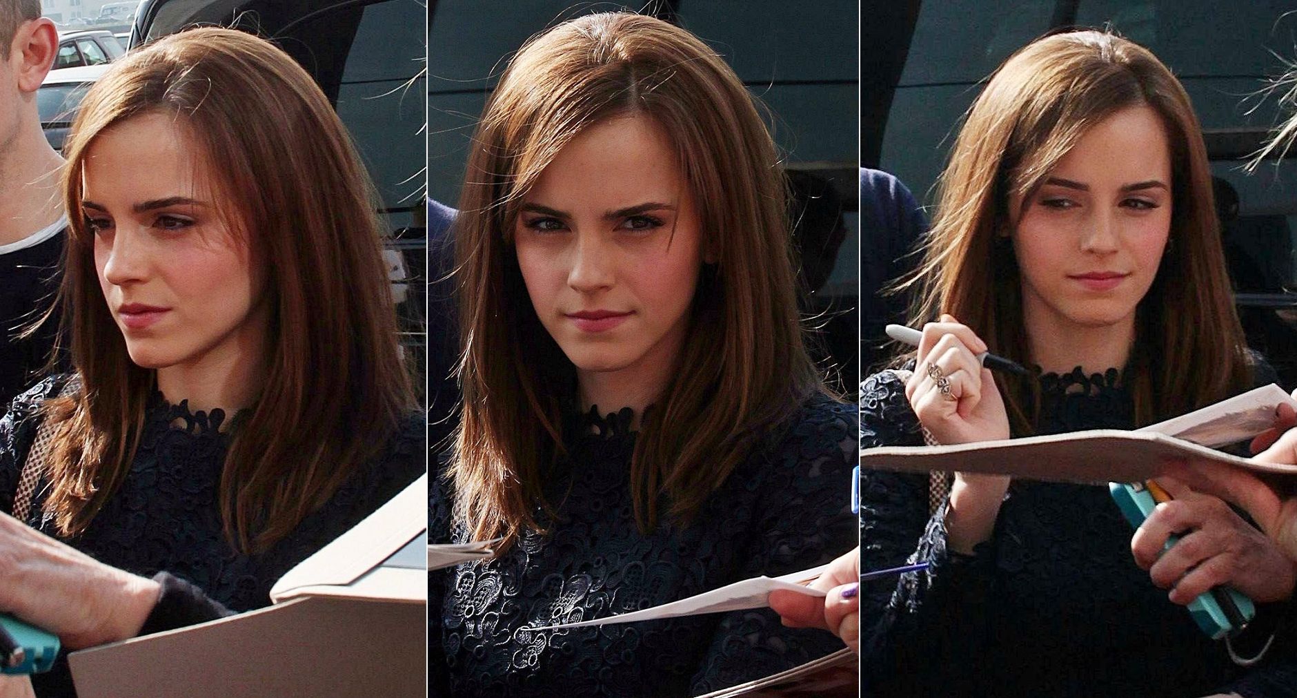 Signing autographs. | Scrolller