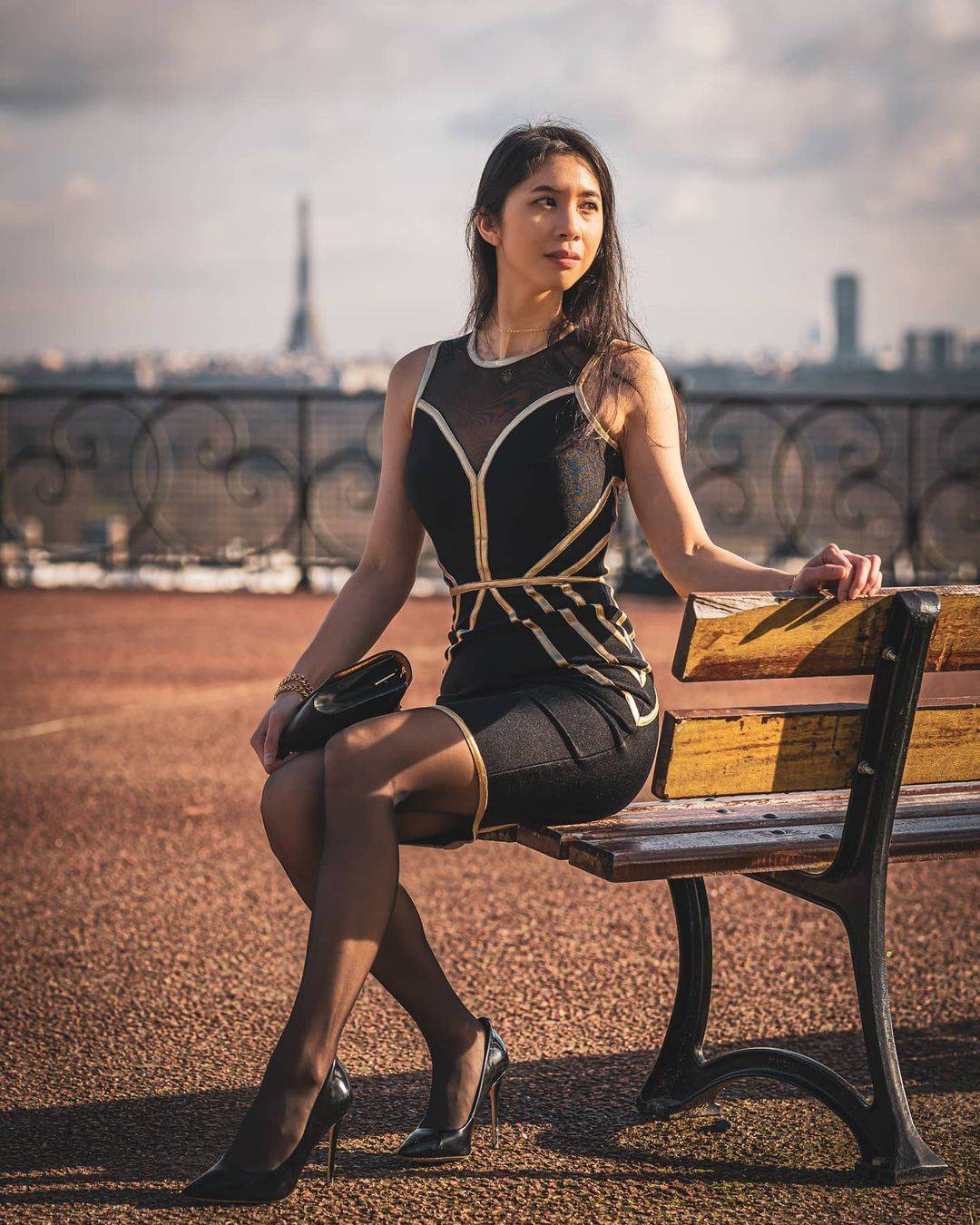 Sitting on a bench | Scrolller