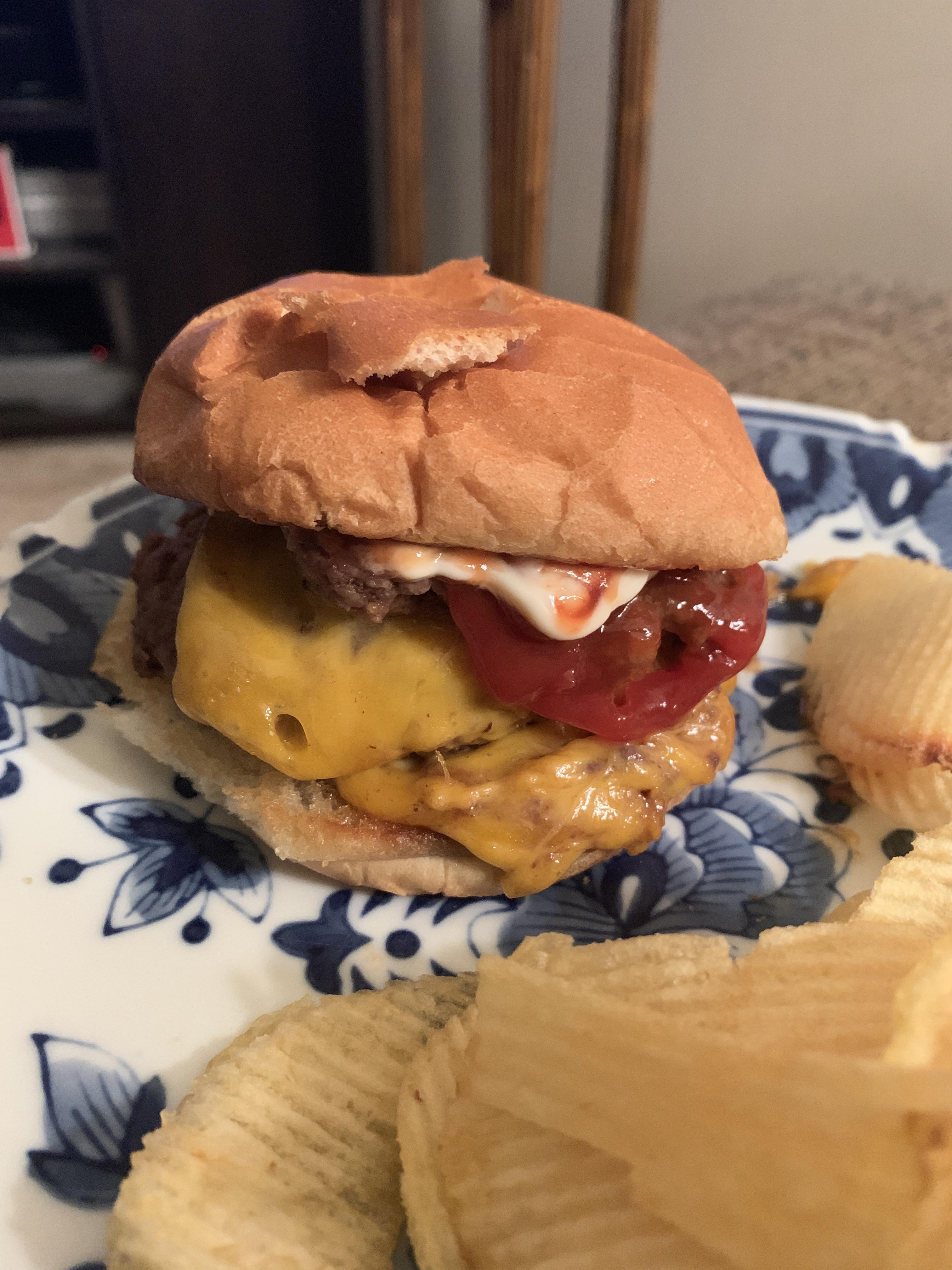 Smash burger with mayo, ketchup, and cheddar cheese | Scrolller