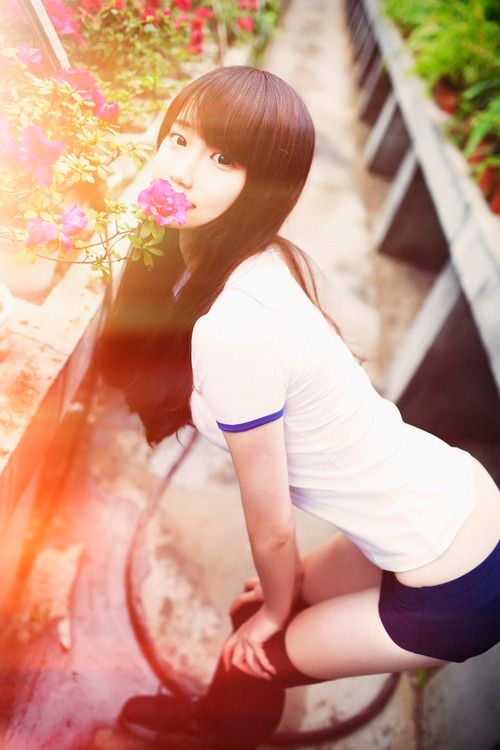 Smelling Flower | Scrolller