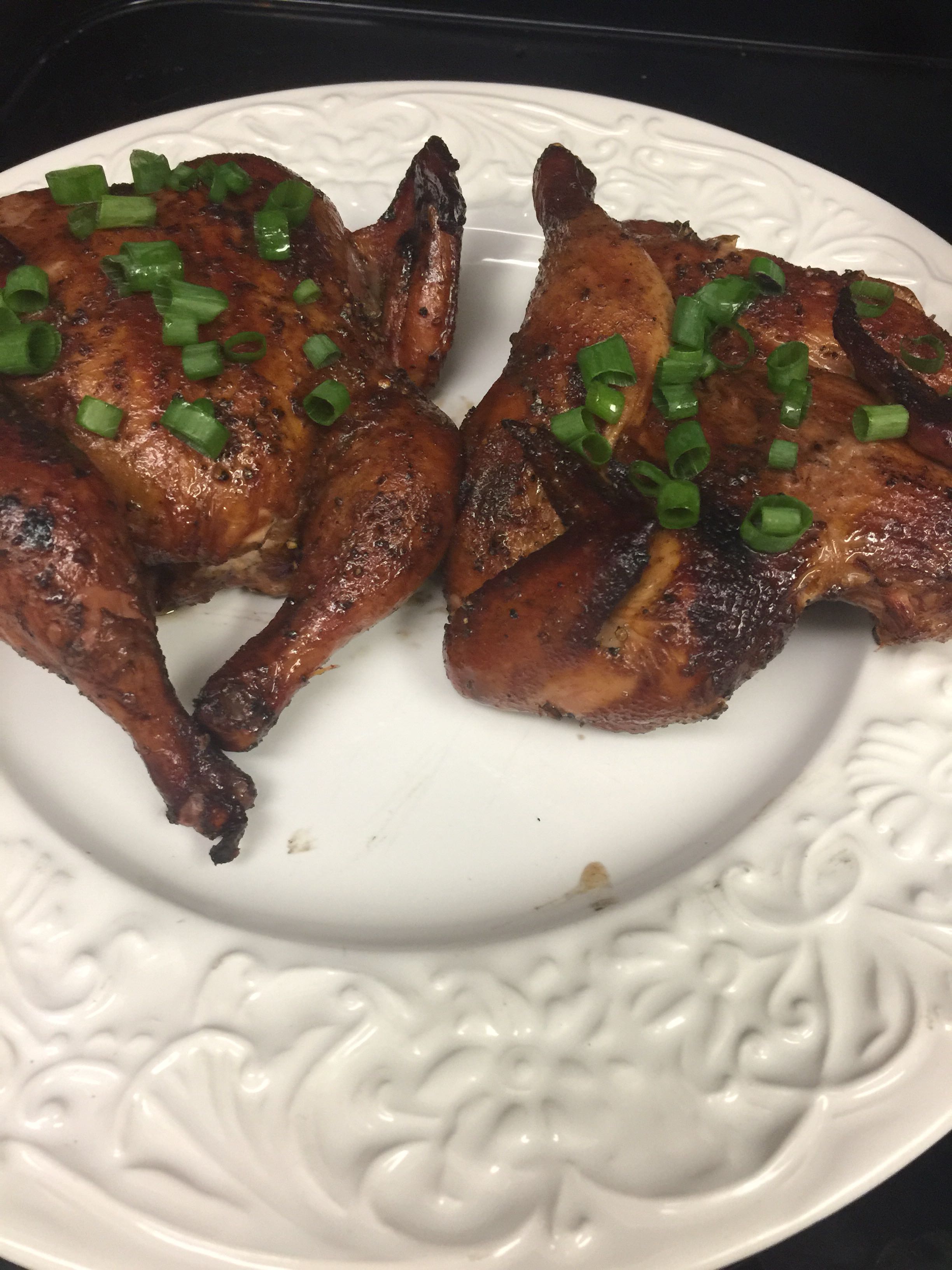 Smoke-Roasted Cornish game hens with a Kentucky fire sauce. | Scrolller