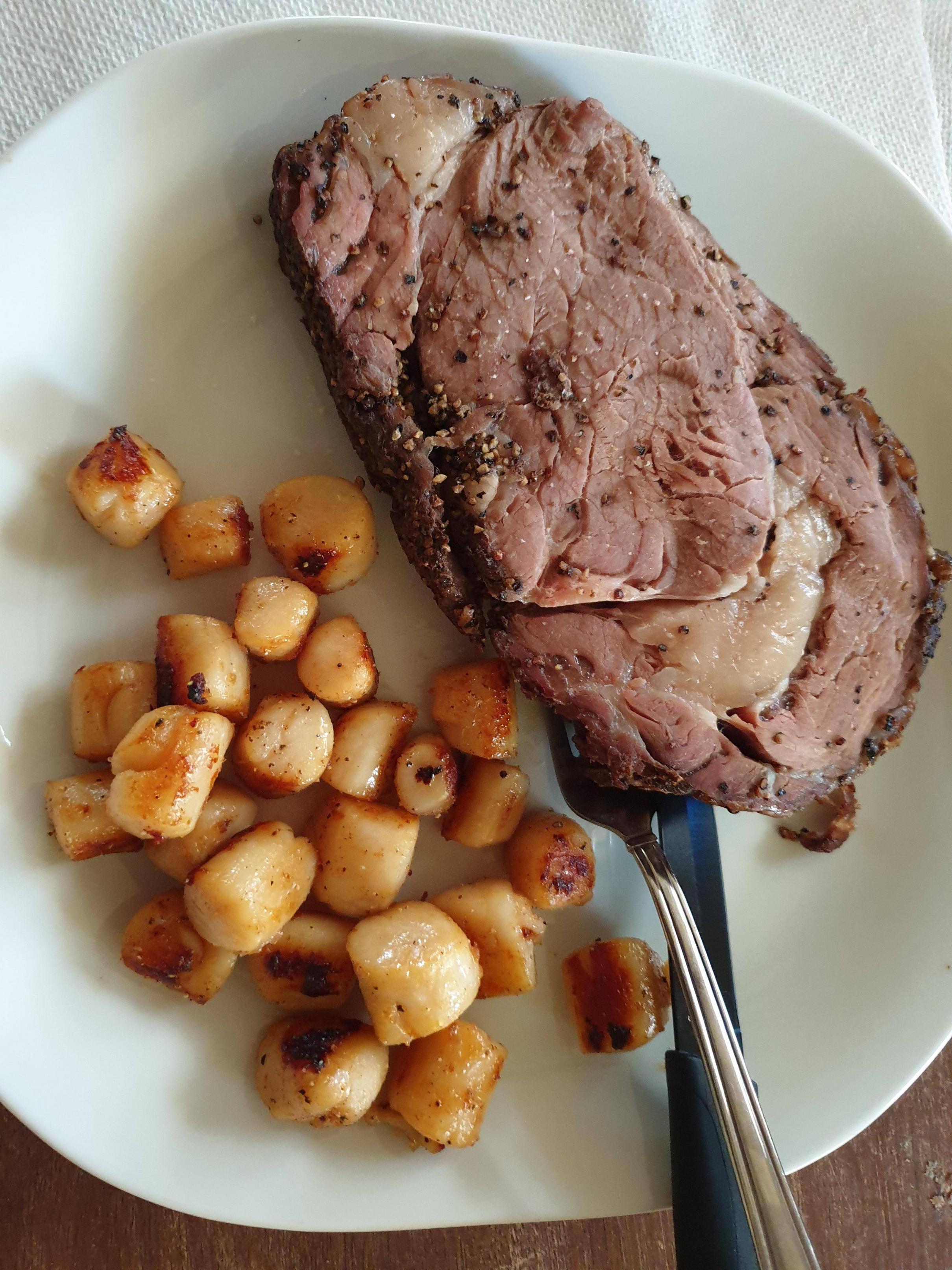 Smoked prime rib and pan seared scallops. | Scrolller