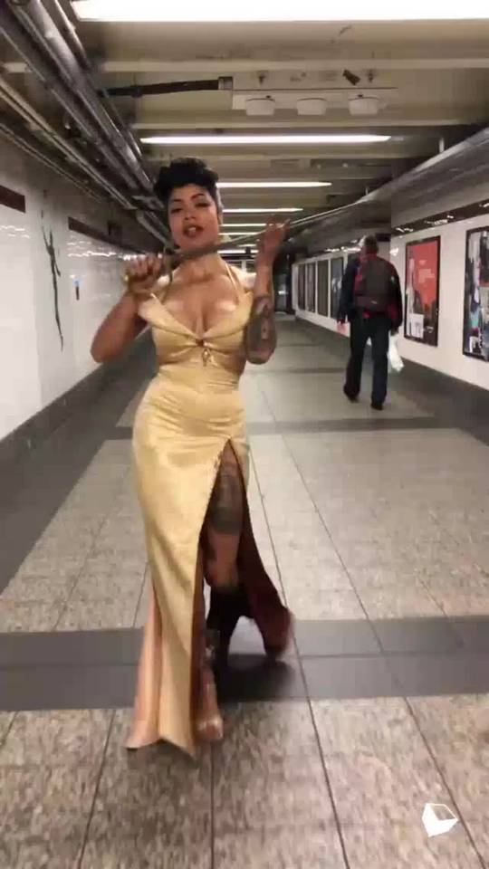 Subway sword swallower. | Scrolller