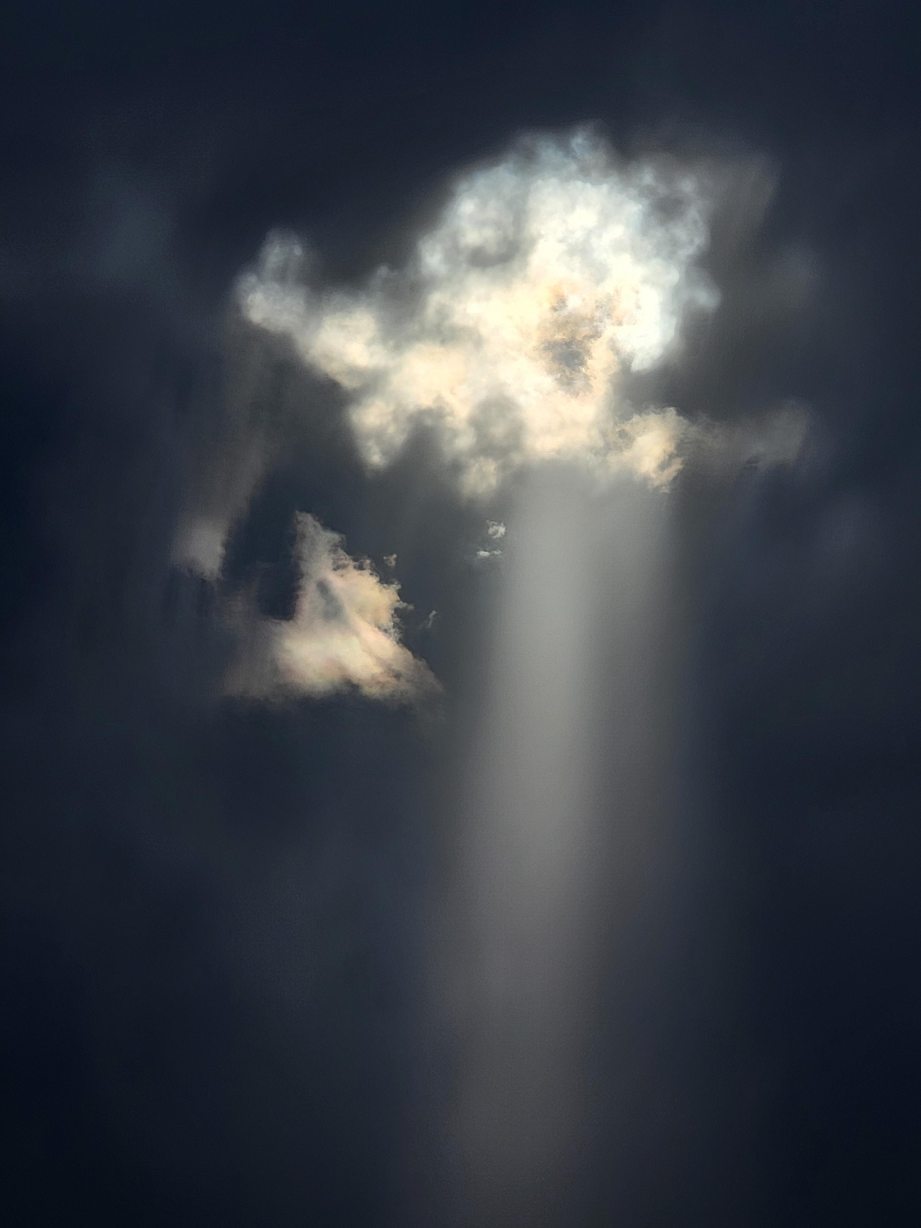 Sunbeam through a storm cloud | Scrolller
