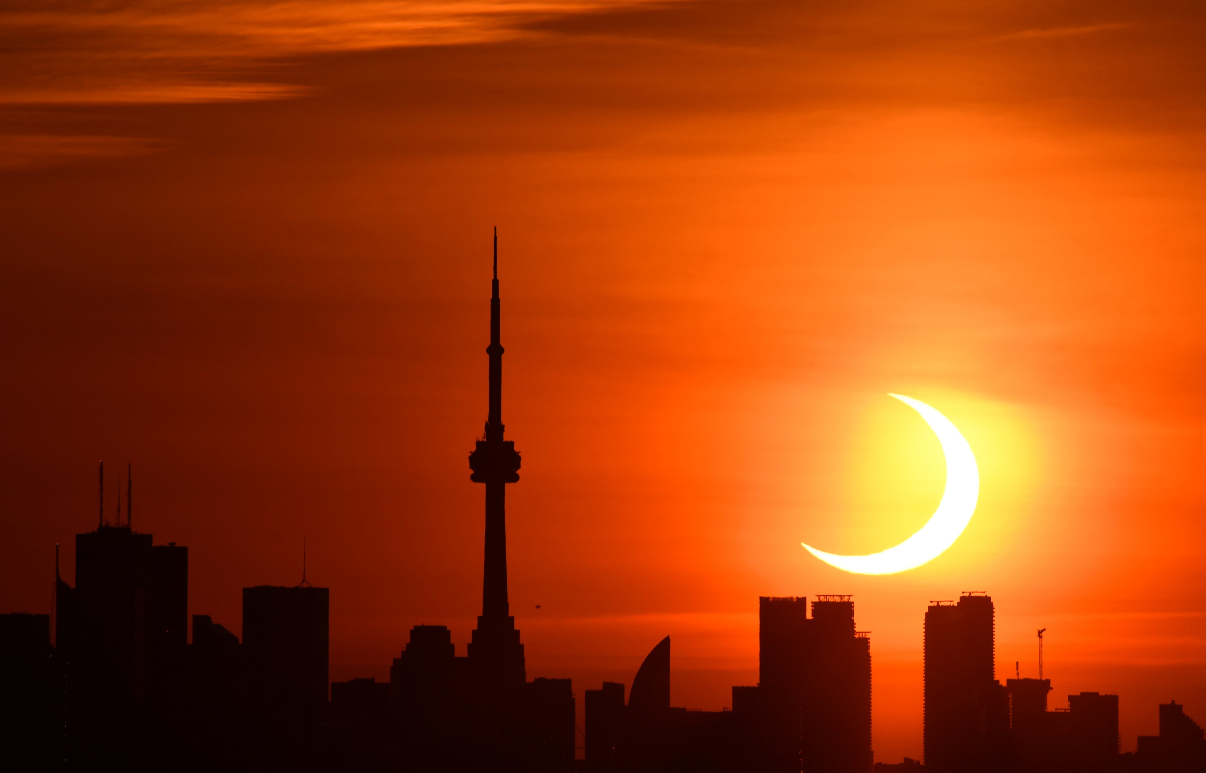 Sunrise solar eclipse | Scrolller