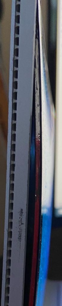 Surface battery is just a little swole. But the unit is still working... | Scrolller