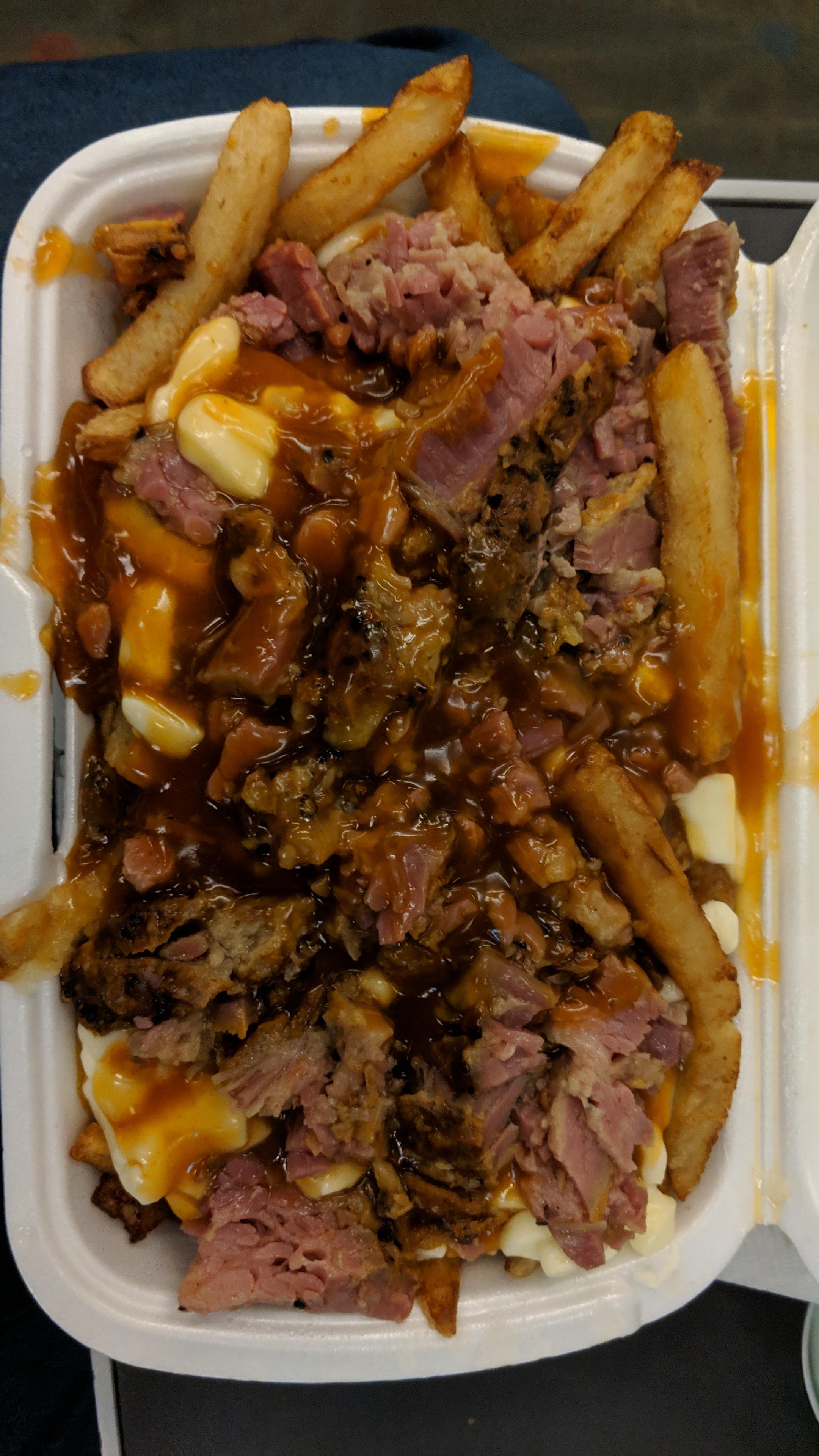 Takeout smoked meat poutine from La Belle Province | Scrolller
