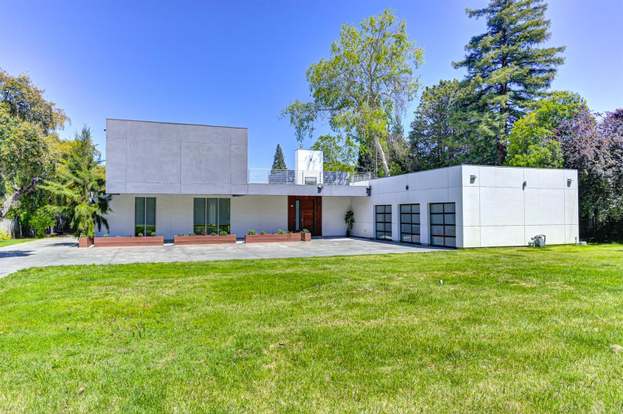 The City of Townsville... is under attack by modern architecture! | Scrolller