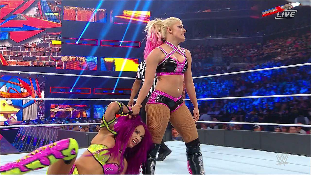 The Goddess stands tall holding Sasha by her hair. | Scrolller