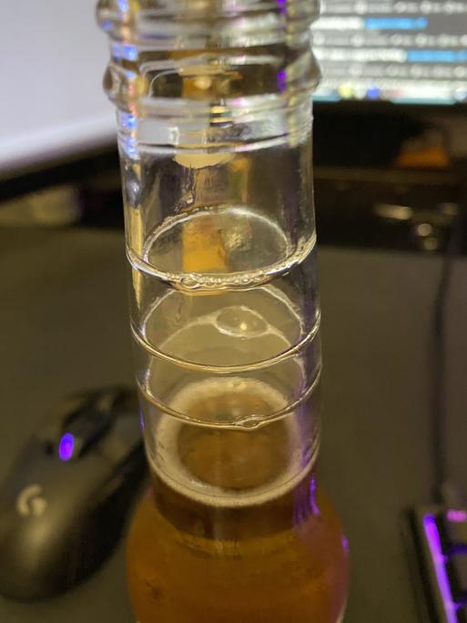 The way bubbles formed in my beer bottle | Scrolller