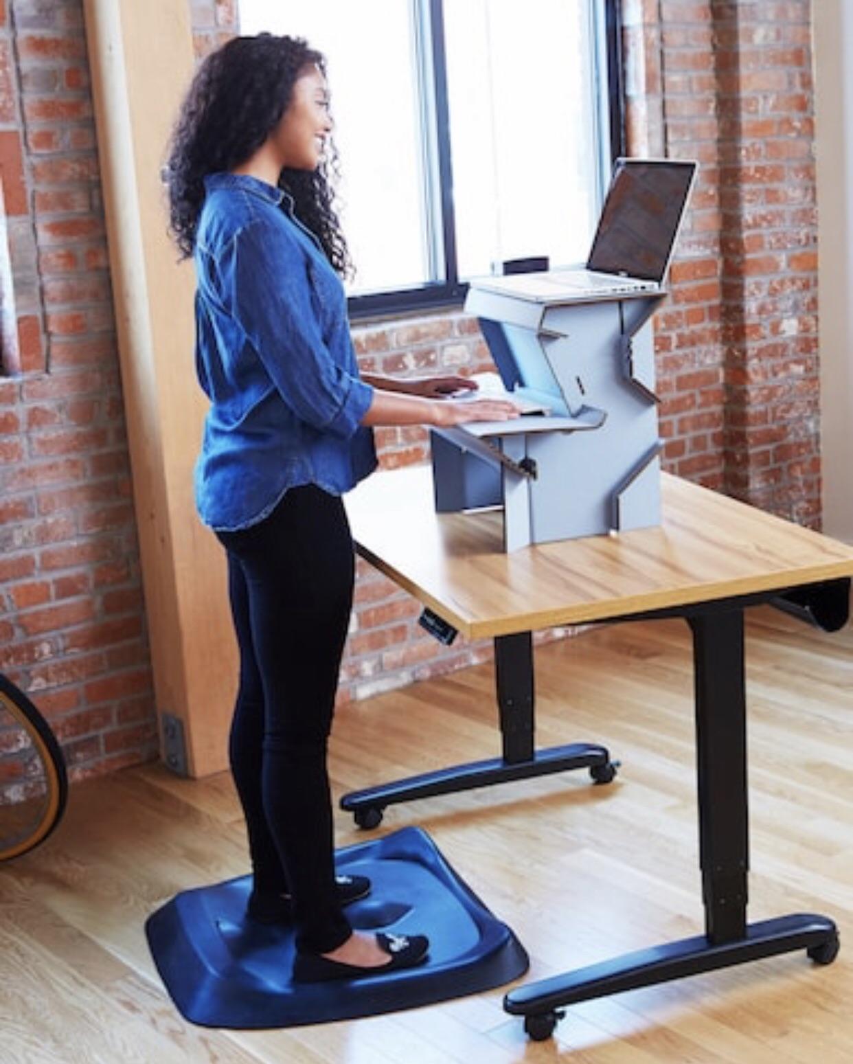 This ad for a standing desk box, place on top of an actual standing desk | Scrolller