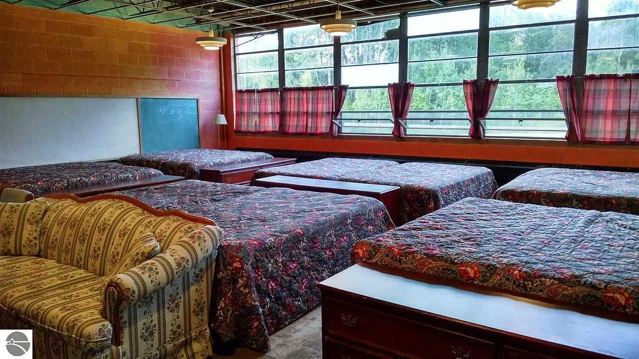 This converted school building "memory maker" is 1000% a cult compound | Scrolller