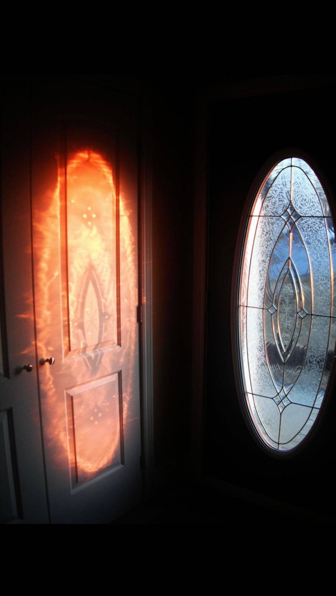 This door's reflection in the evening | Scrolller