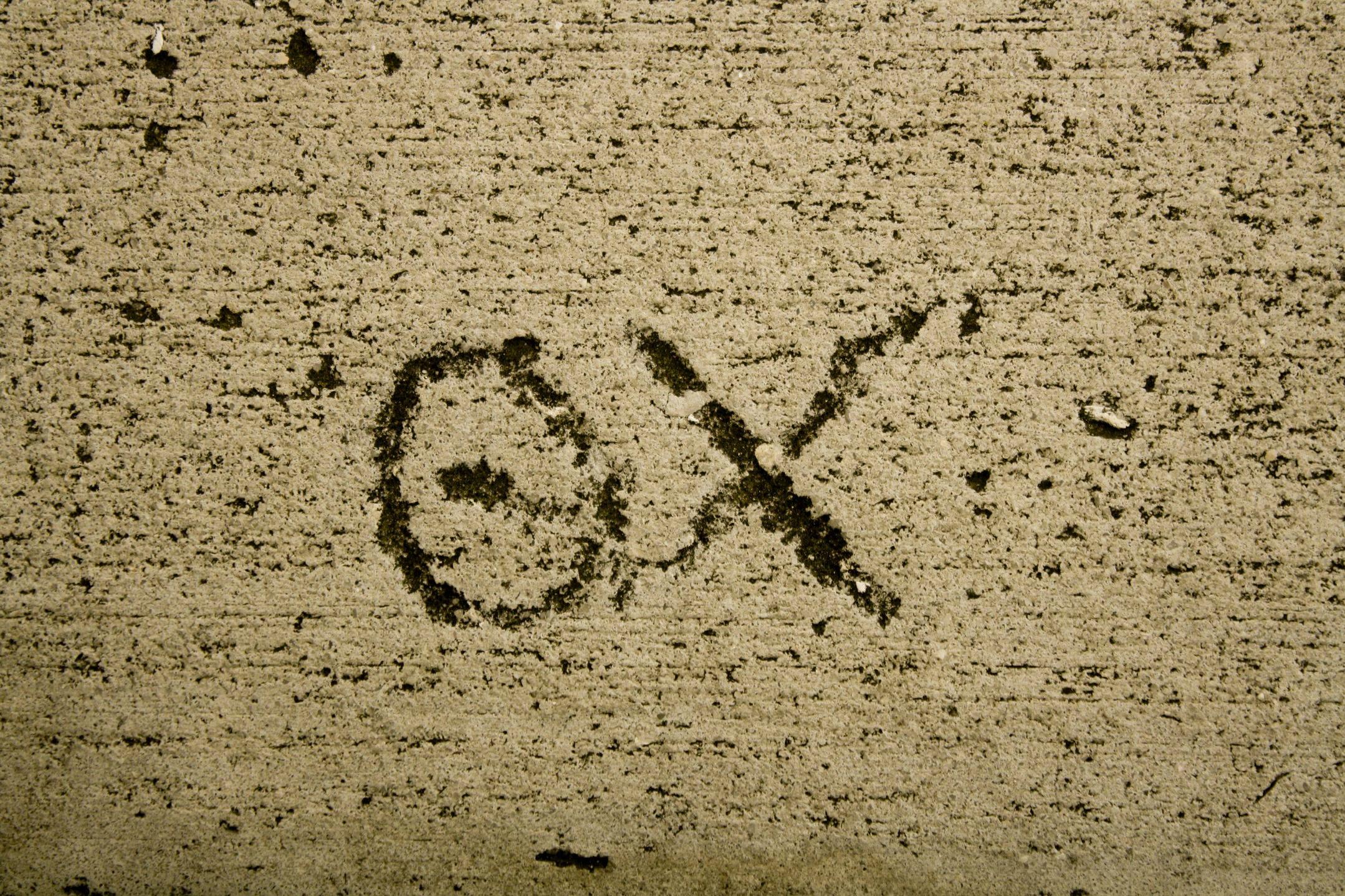 This was scraped into the sidewalk back in the 50's. It's still there. Theta Chi for Life ...