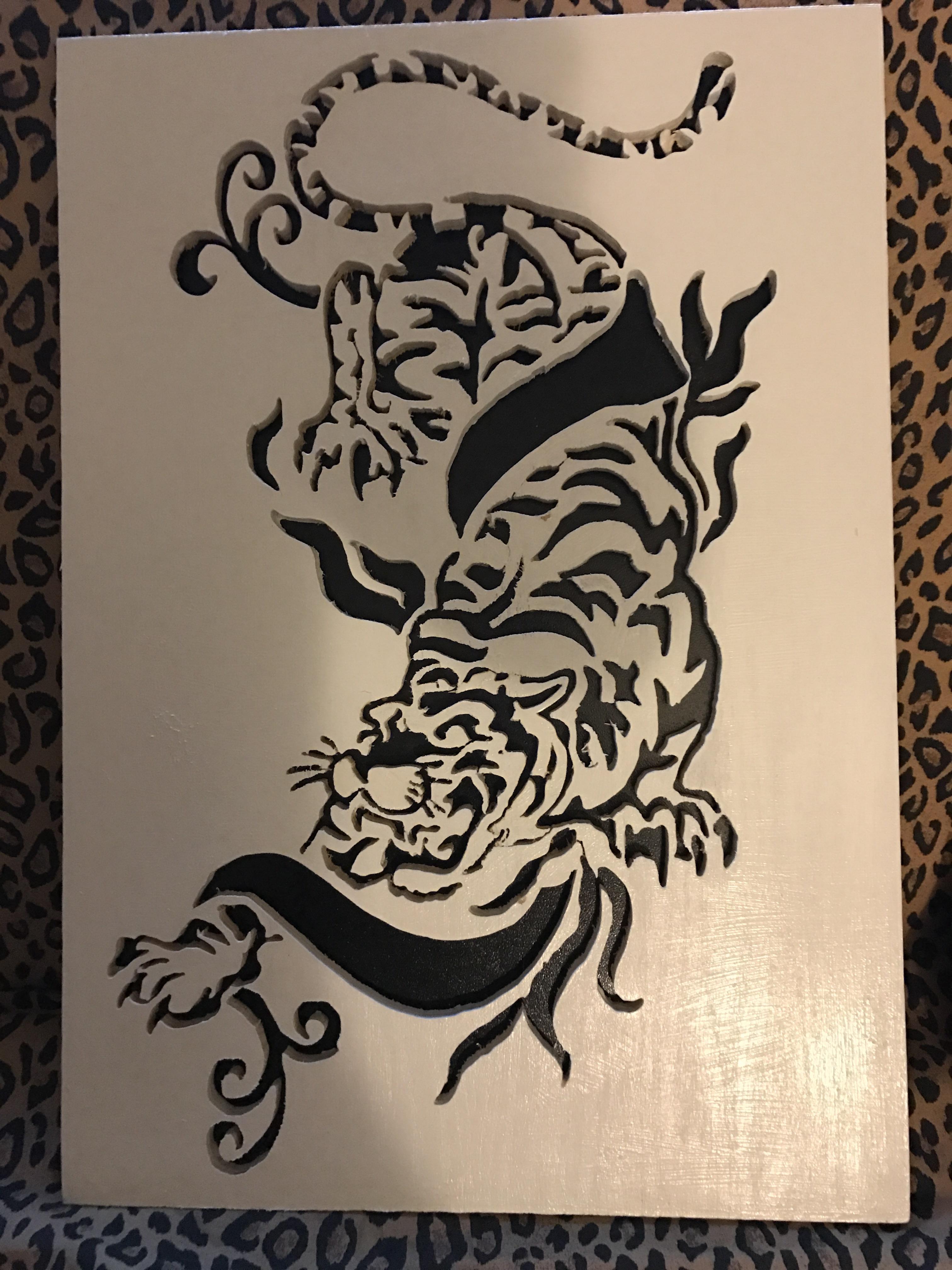Tiger on plywood | Scrolller