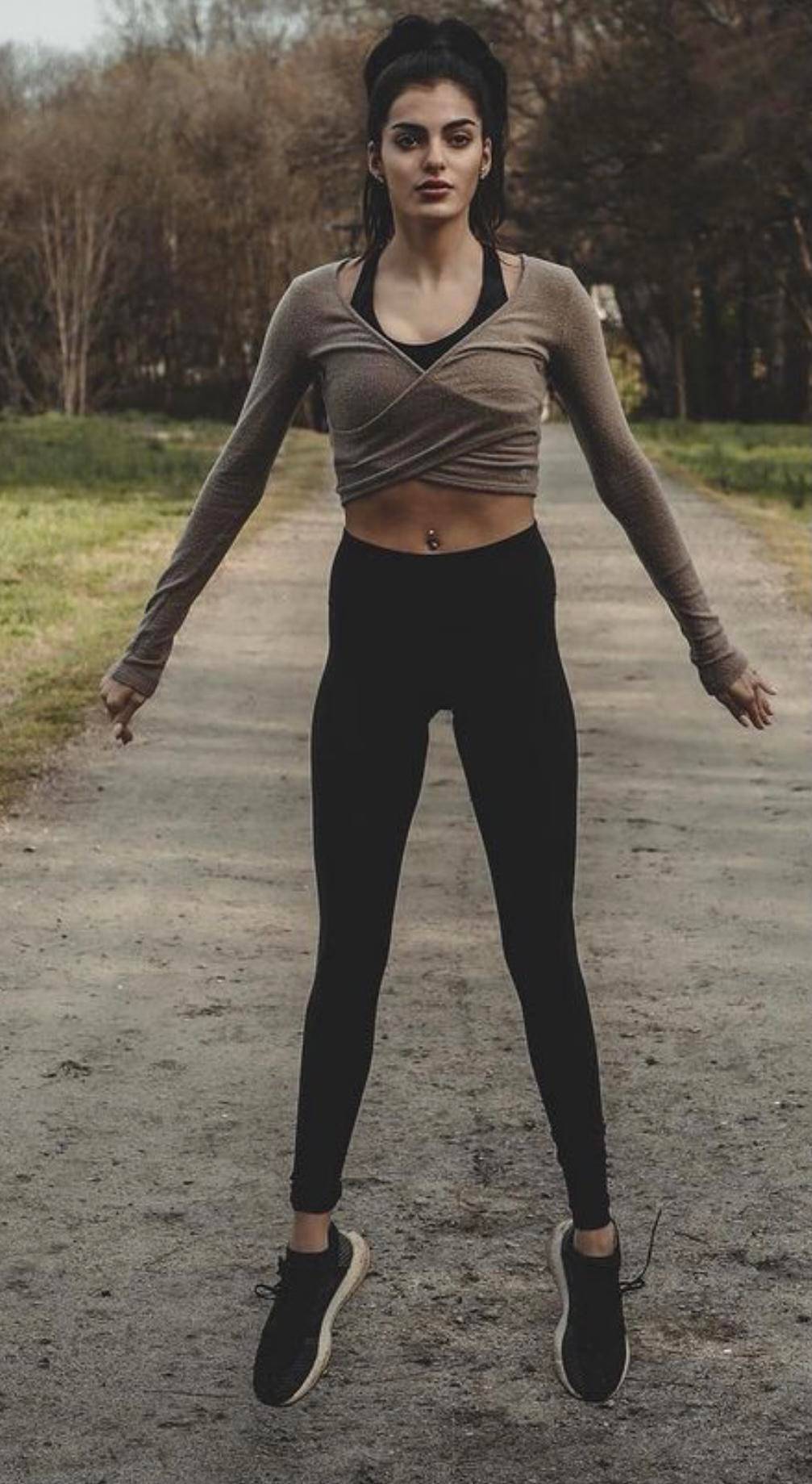 Toni Breidinger with a belly button piercing | Scrolller