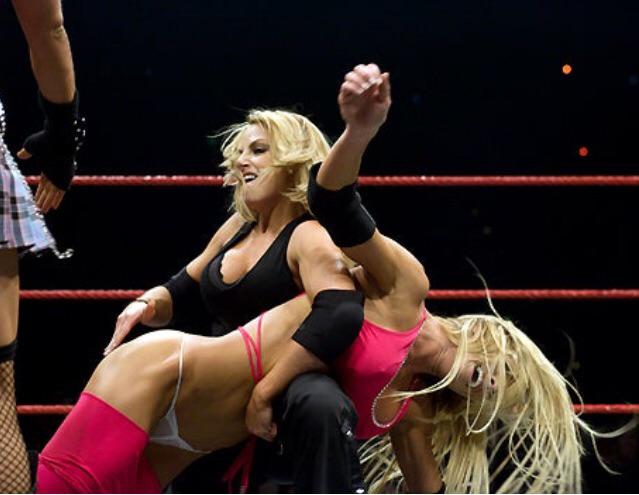 Trish spanking Torrie | Scrolller