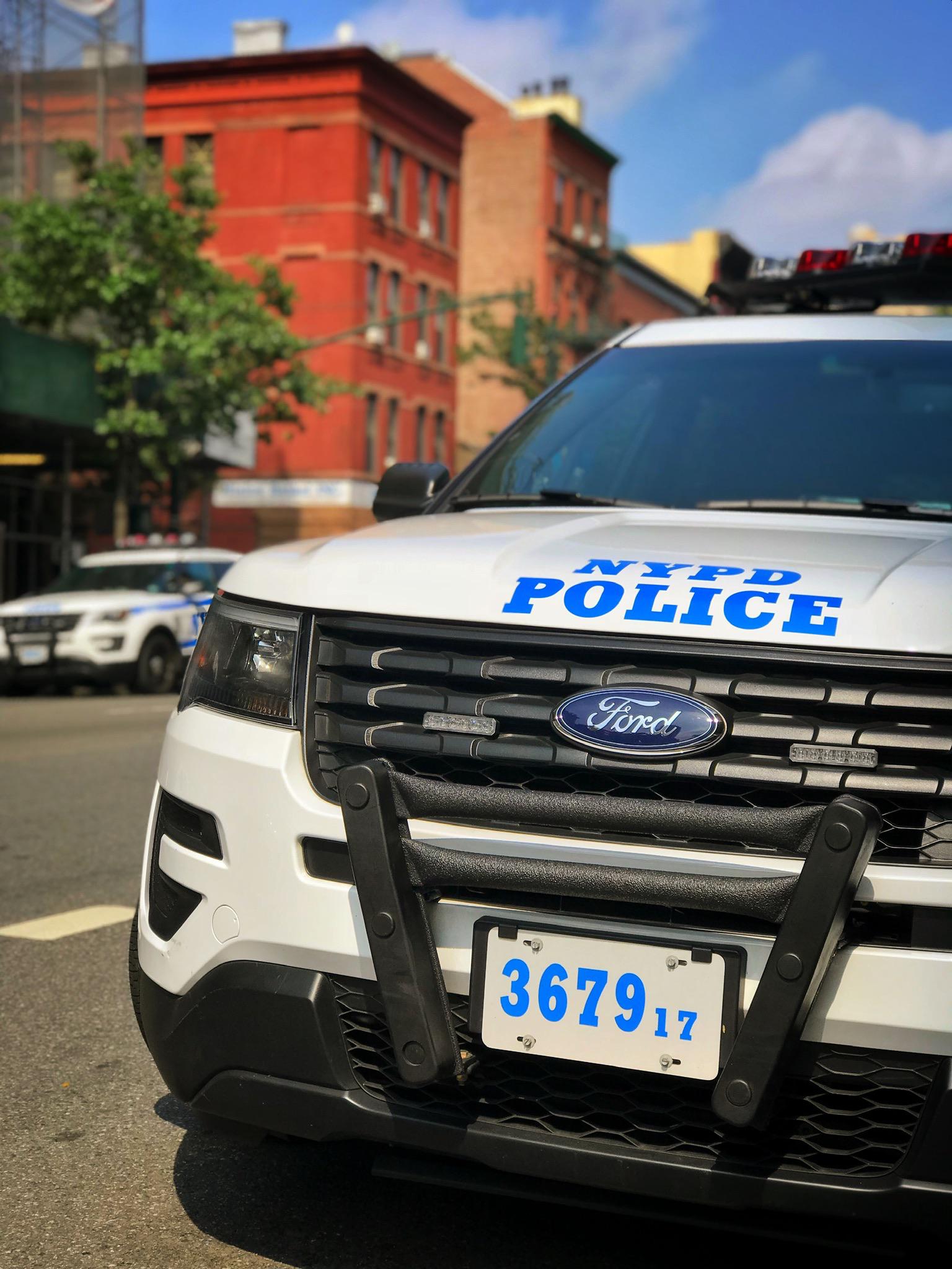 Two NYPD cruisers across the street from one another. | Scrolller