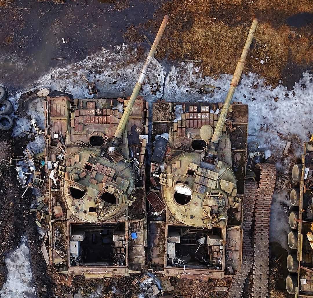 Two T80BVs in tank graveyard | Scrolller