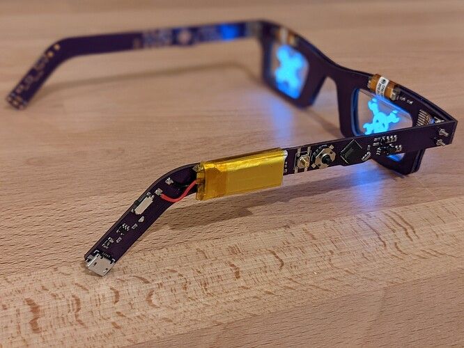 Two transparent OLED displays mounted in PCB eyeglass frame. | Scrolller