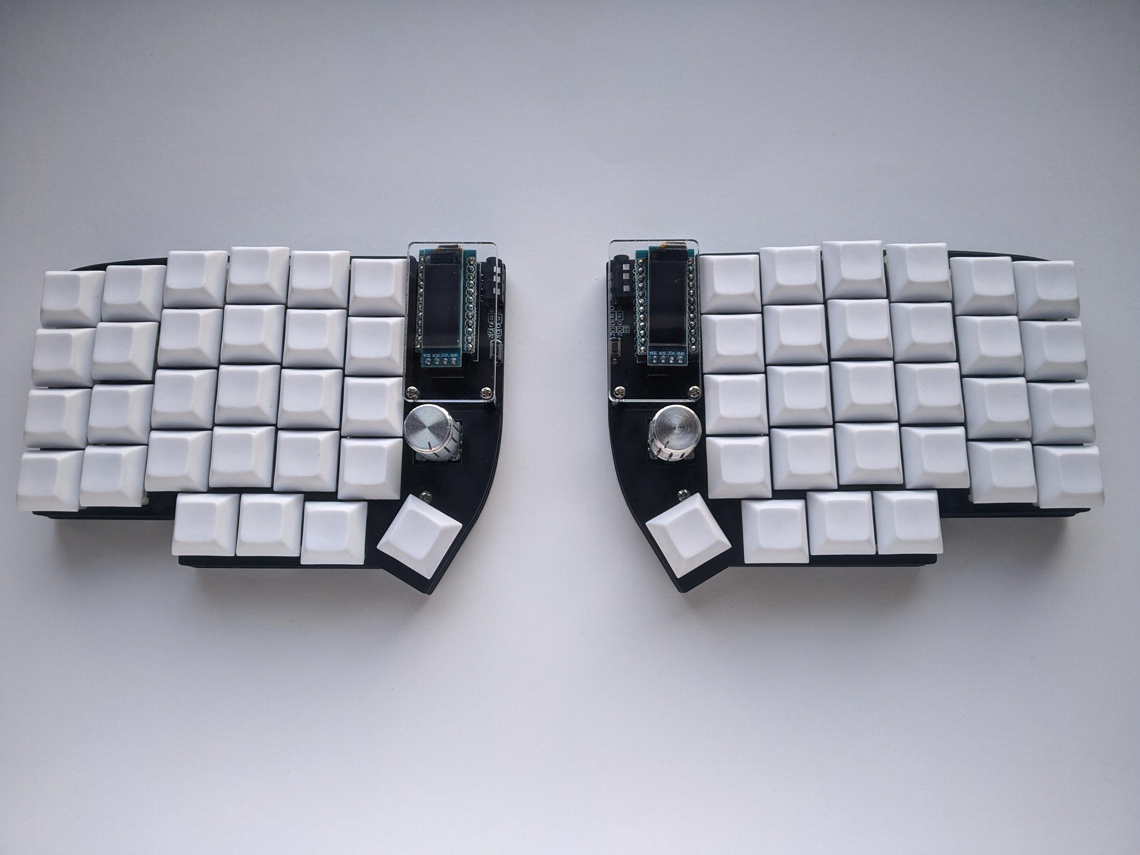 Update on open-sourced Lily58 Pro with rotary encoders. | Scrolller Update on open-sourced Lily58 Pro with rotary encoders. | Scrolller