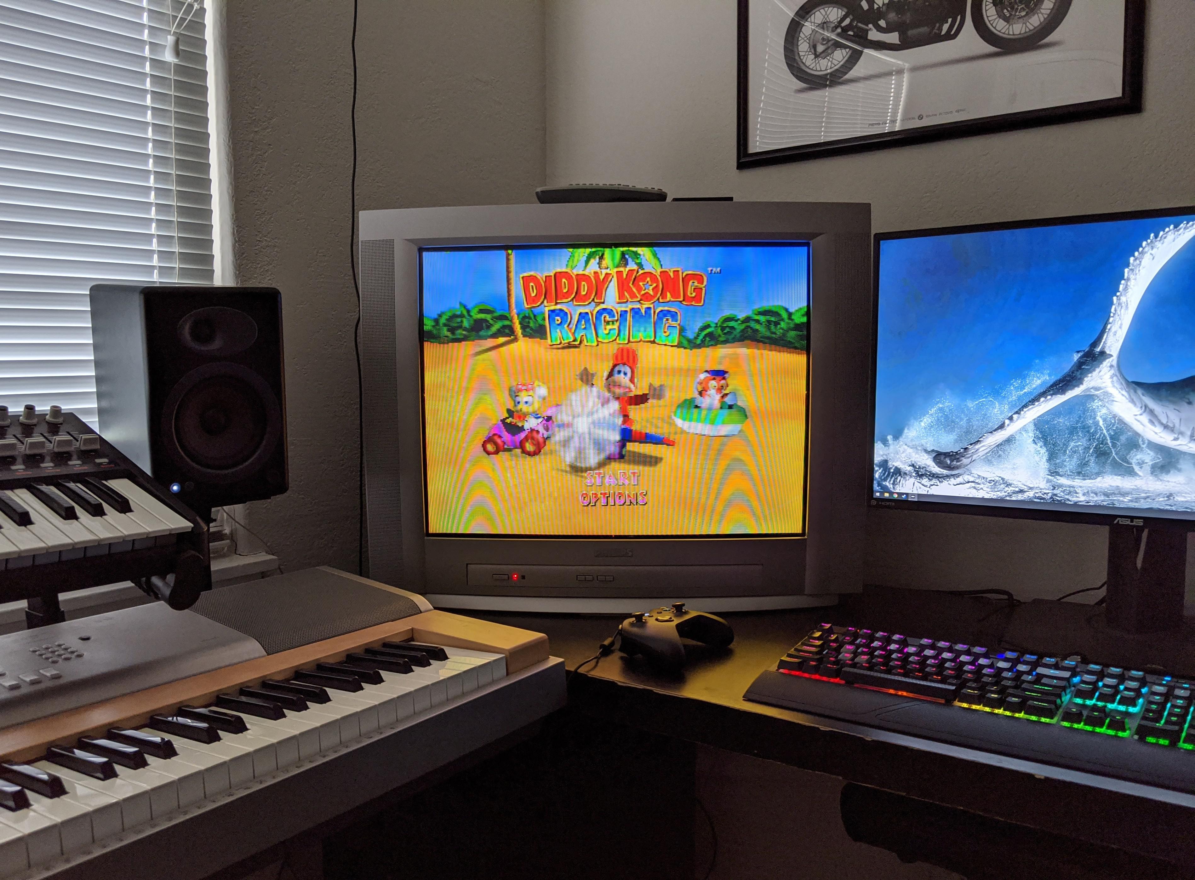 Upgraded my computer, rewired my office, and finished my emulation setup! Diddy approves ...