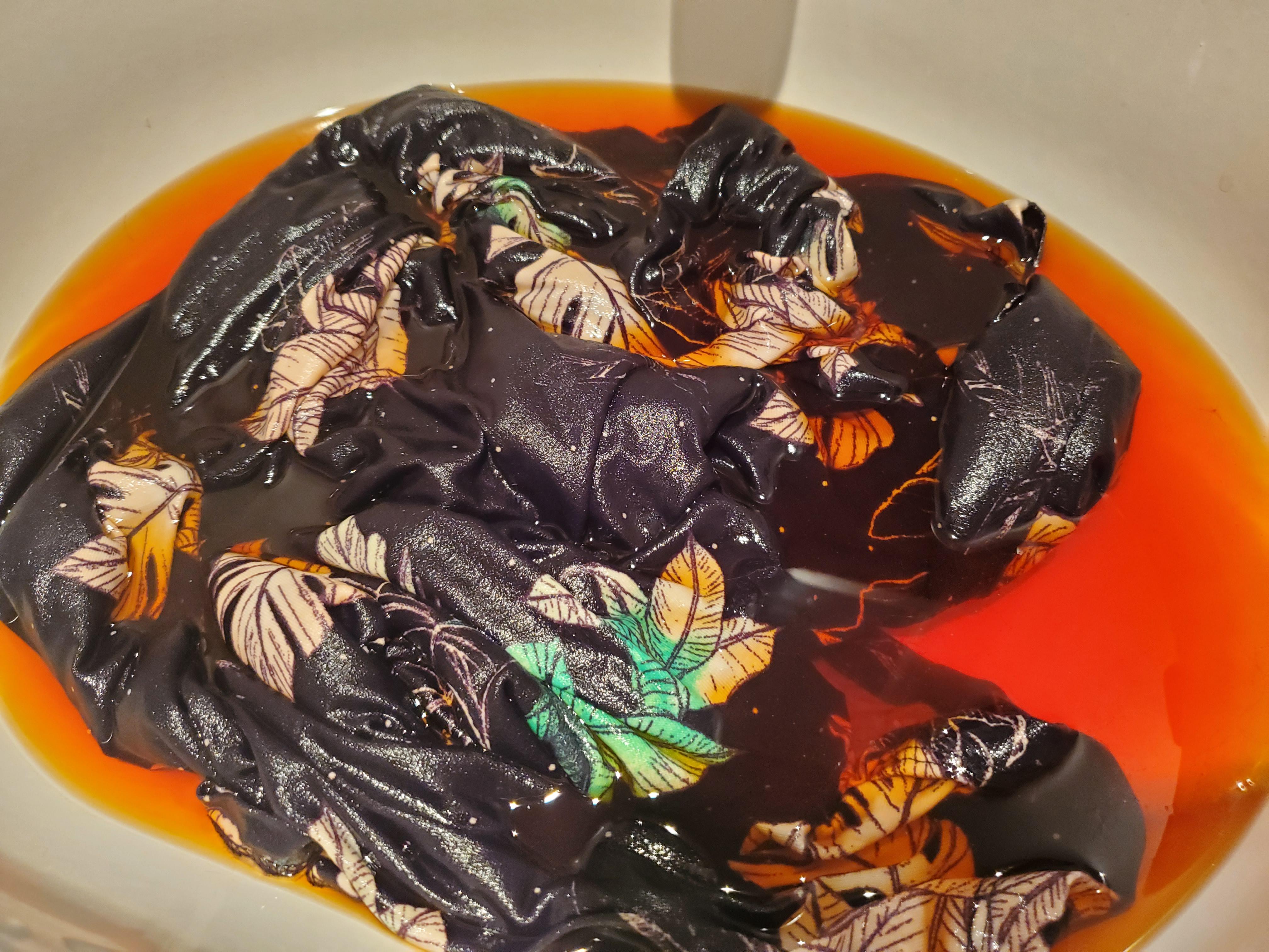 Used shirt is heavily perfumed and turns water orange but hasn't lost ... Used shirt is heavily perfumed and turns water orange but hasn't lost ...