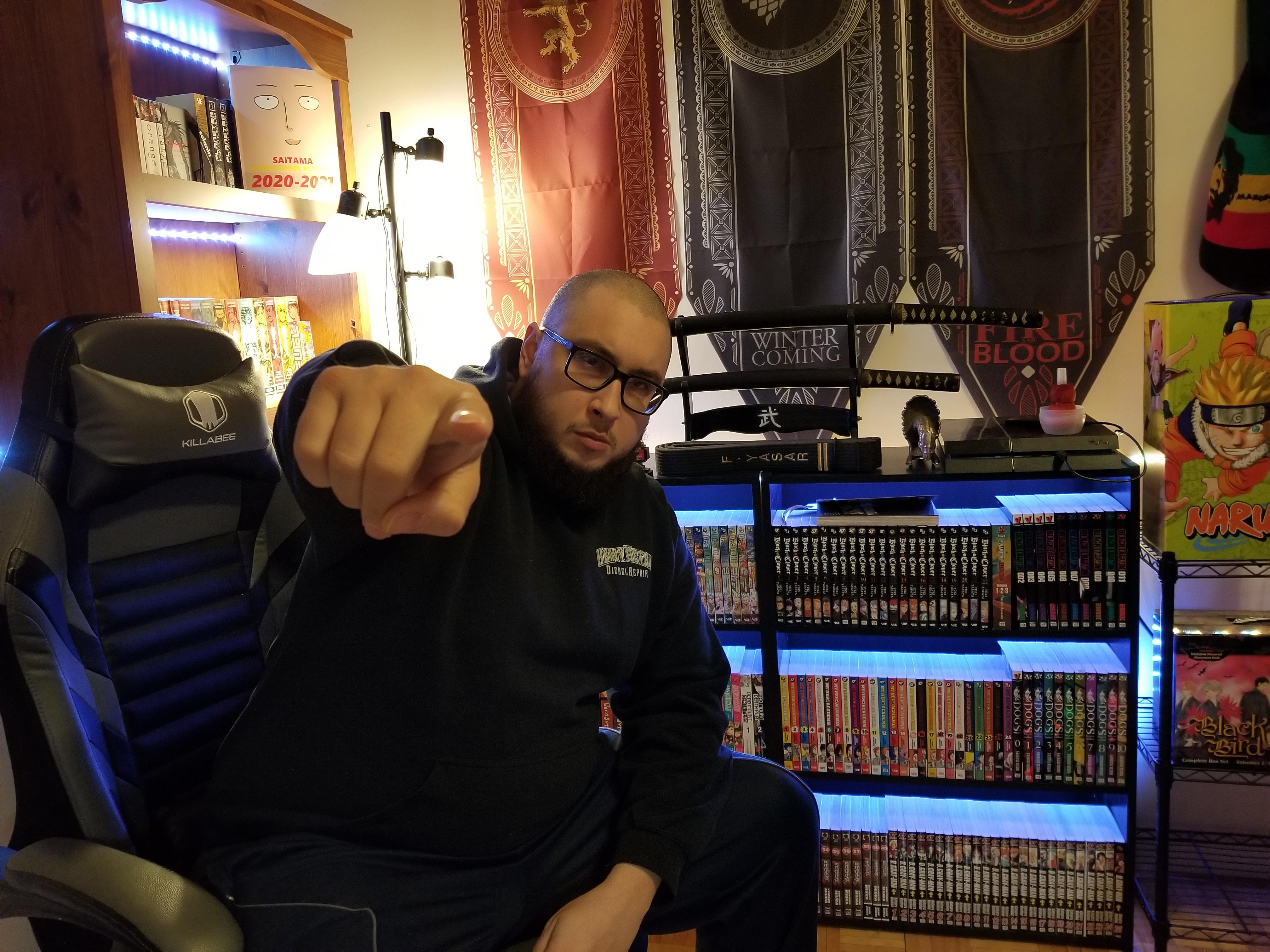 Wanted to snap a pic with my collection and my new shaved head, the new Manga Noob. | Scrolller