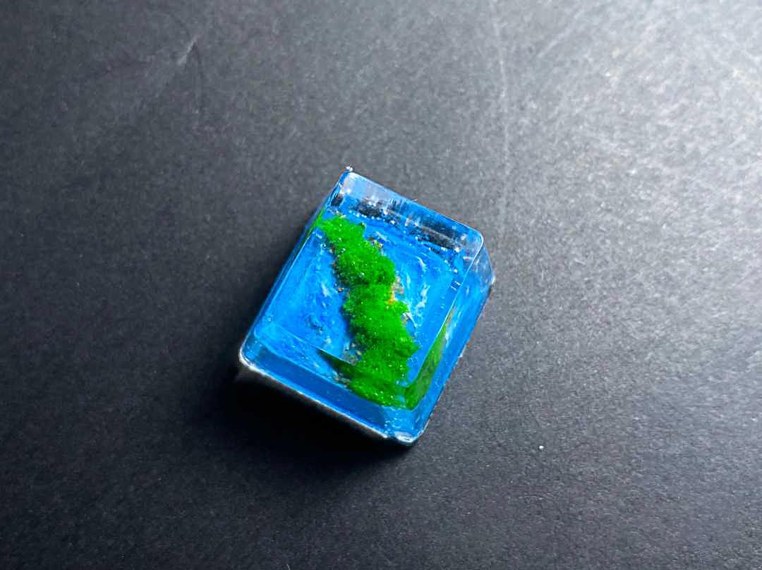 water and green artisan keycap | Scrolller