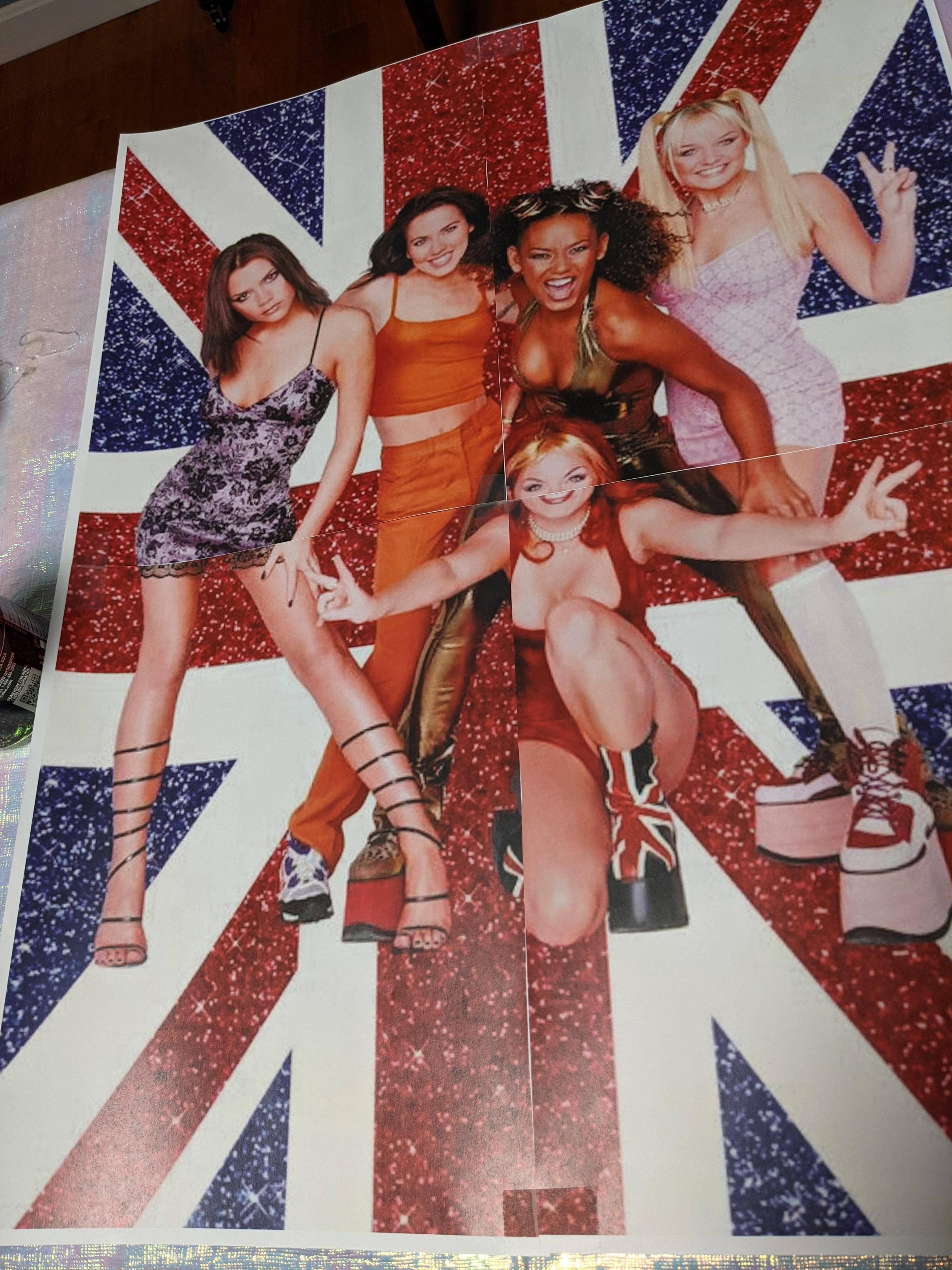 We threw a 90s party, and to save on decorations, my wife decided to print posters on paper and ...