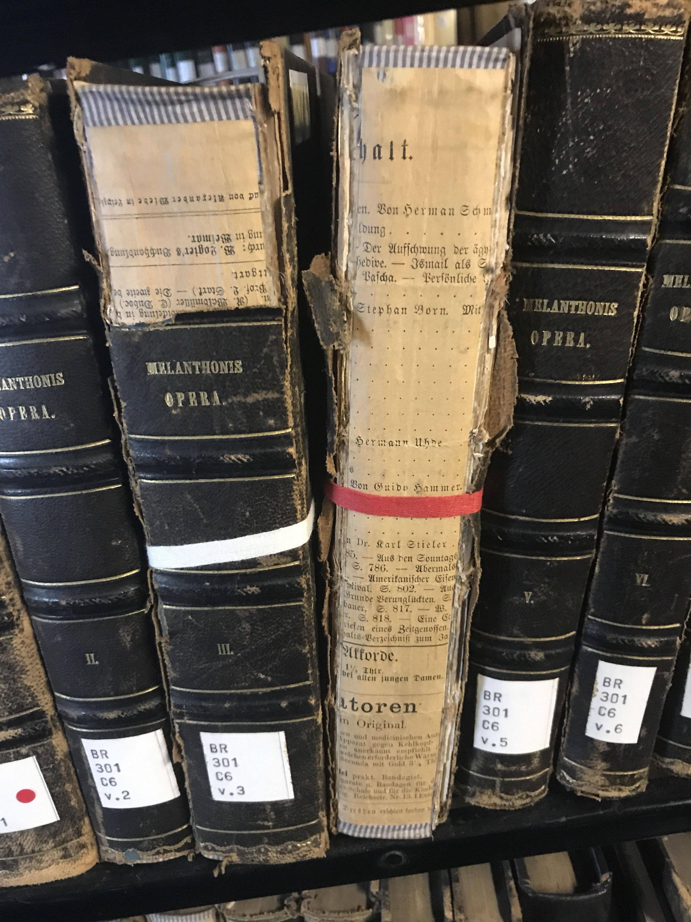 Why is there newspaper in the spine of this really old book? | Scrolller