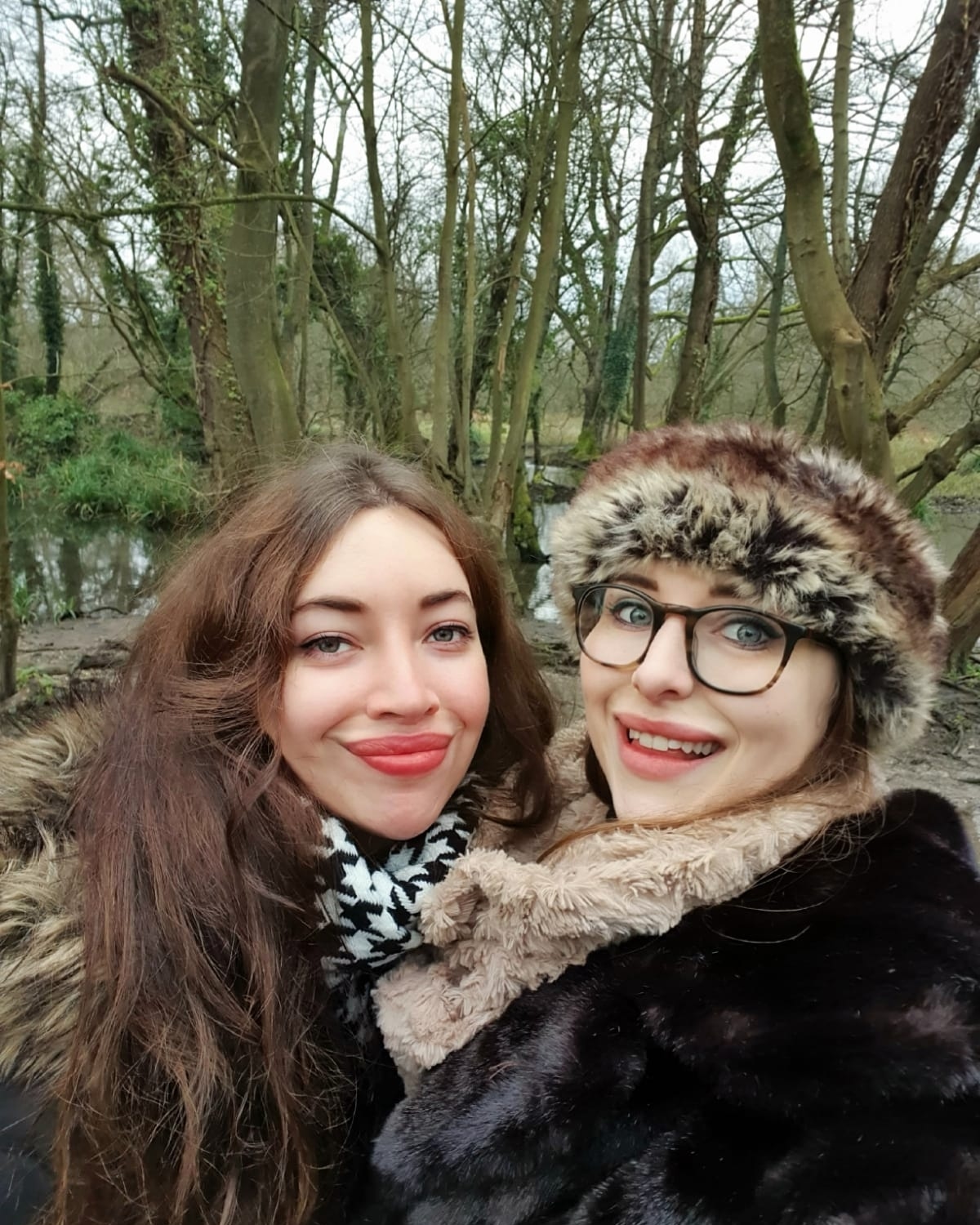 Winter walk between sisters | Scrolller